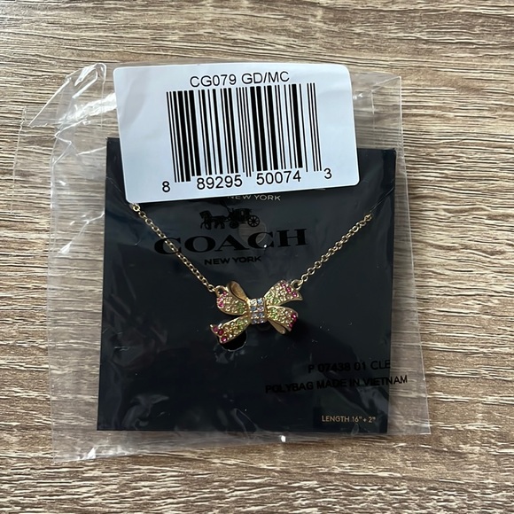Coach | Jewelry | Coach Pave Bow Pendant Necklace | Poshmark